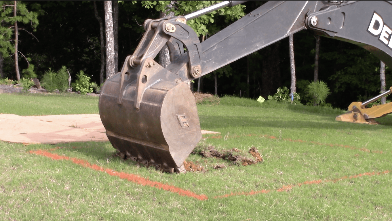 How to Operate a Back Hoe in a Cemetery | A Good Goodbye